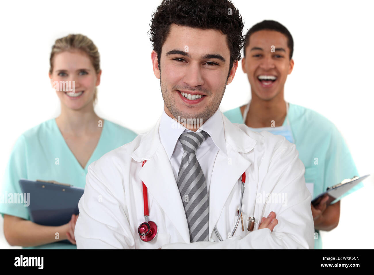 Doctor and nurses laughing Stock Photo - Alamy