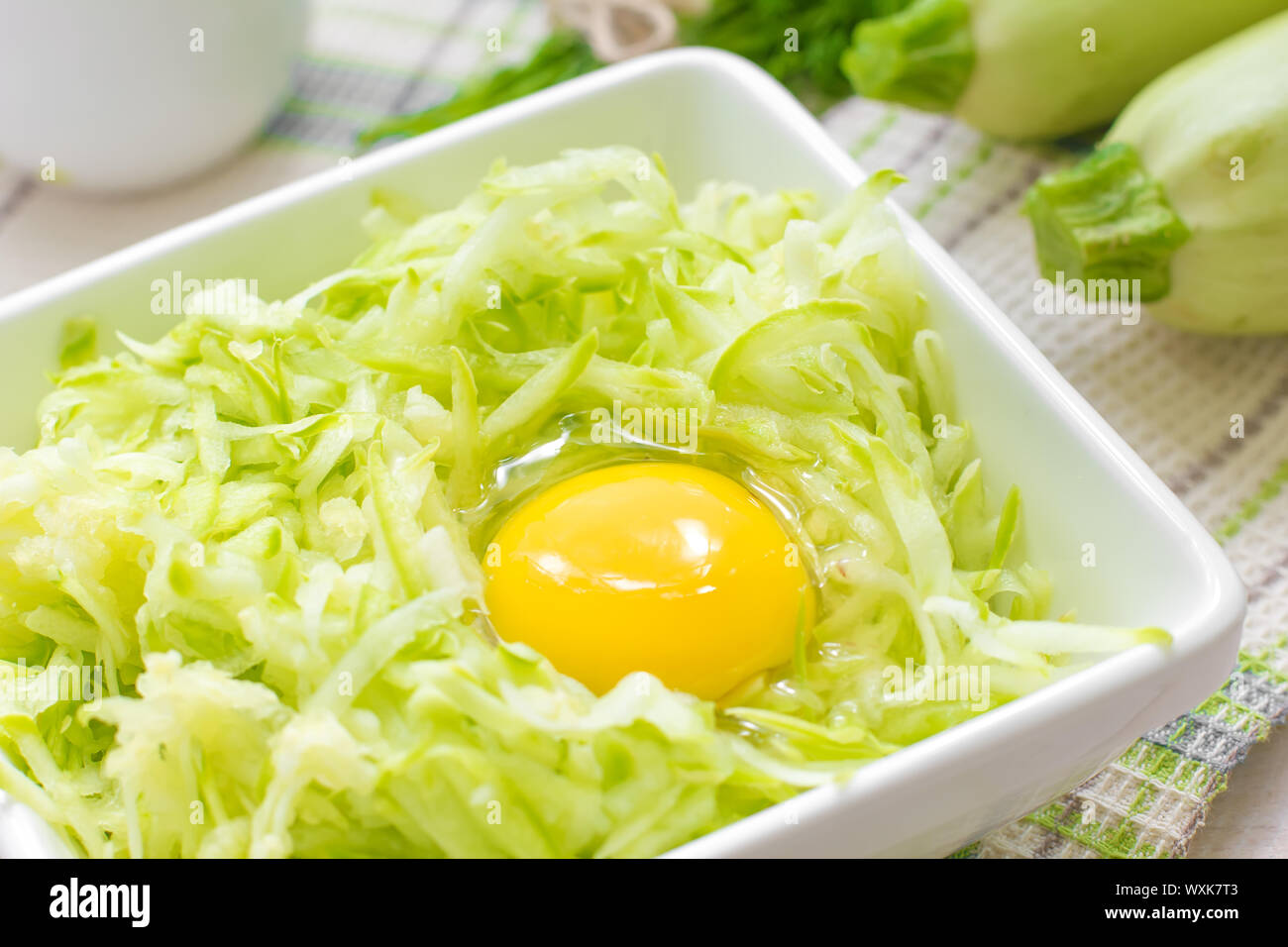 Grated marrow with eggs Stock Photo - Alamy