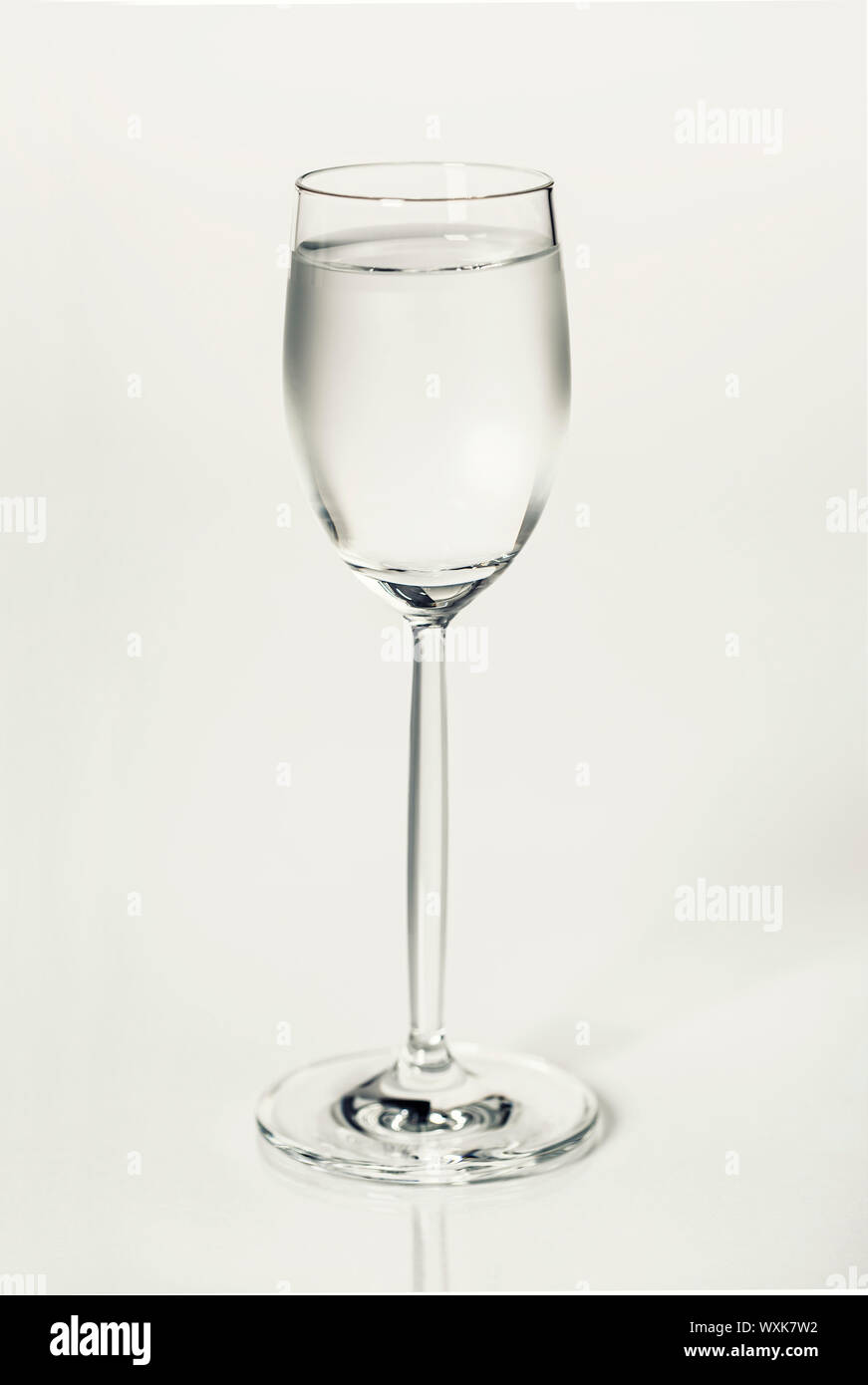 Glass of vodka isolated on white Stock Photo - Alamy