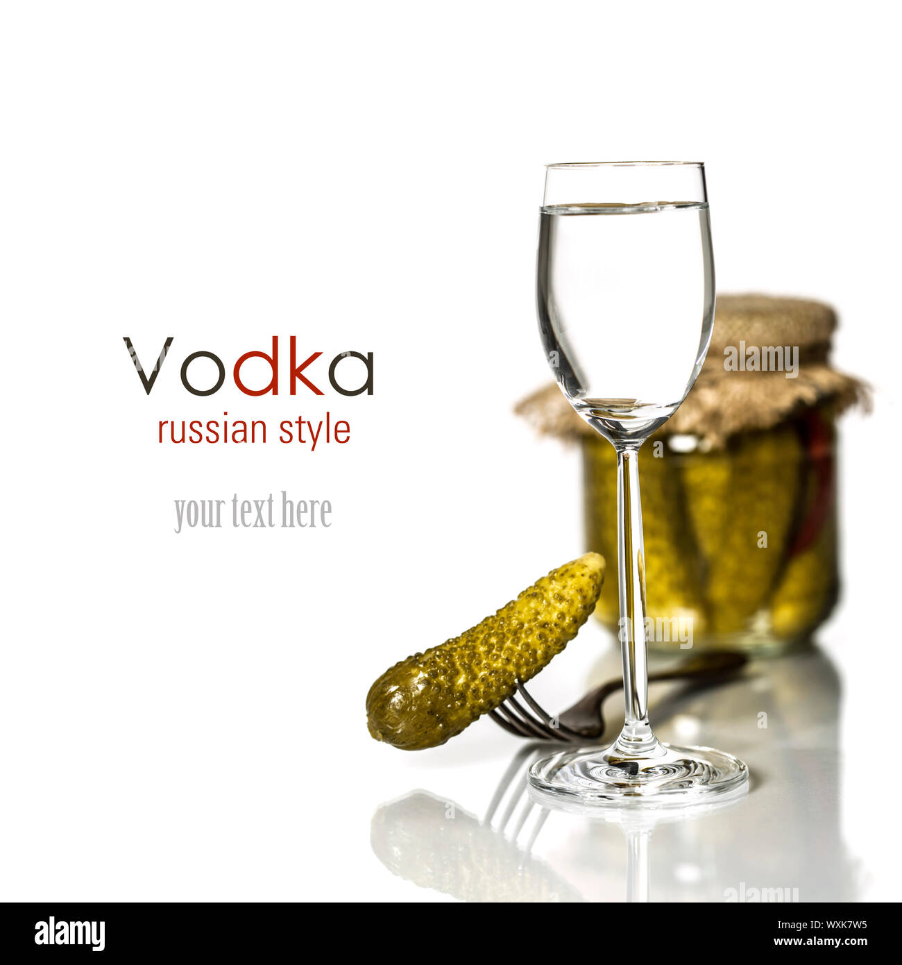 Russian vodka with pickled cucumbers on white background (with easy ...