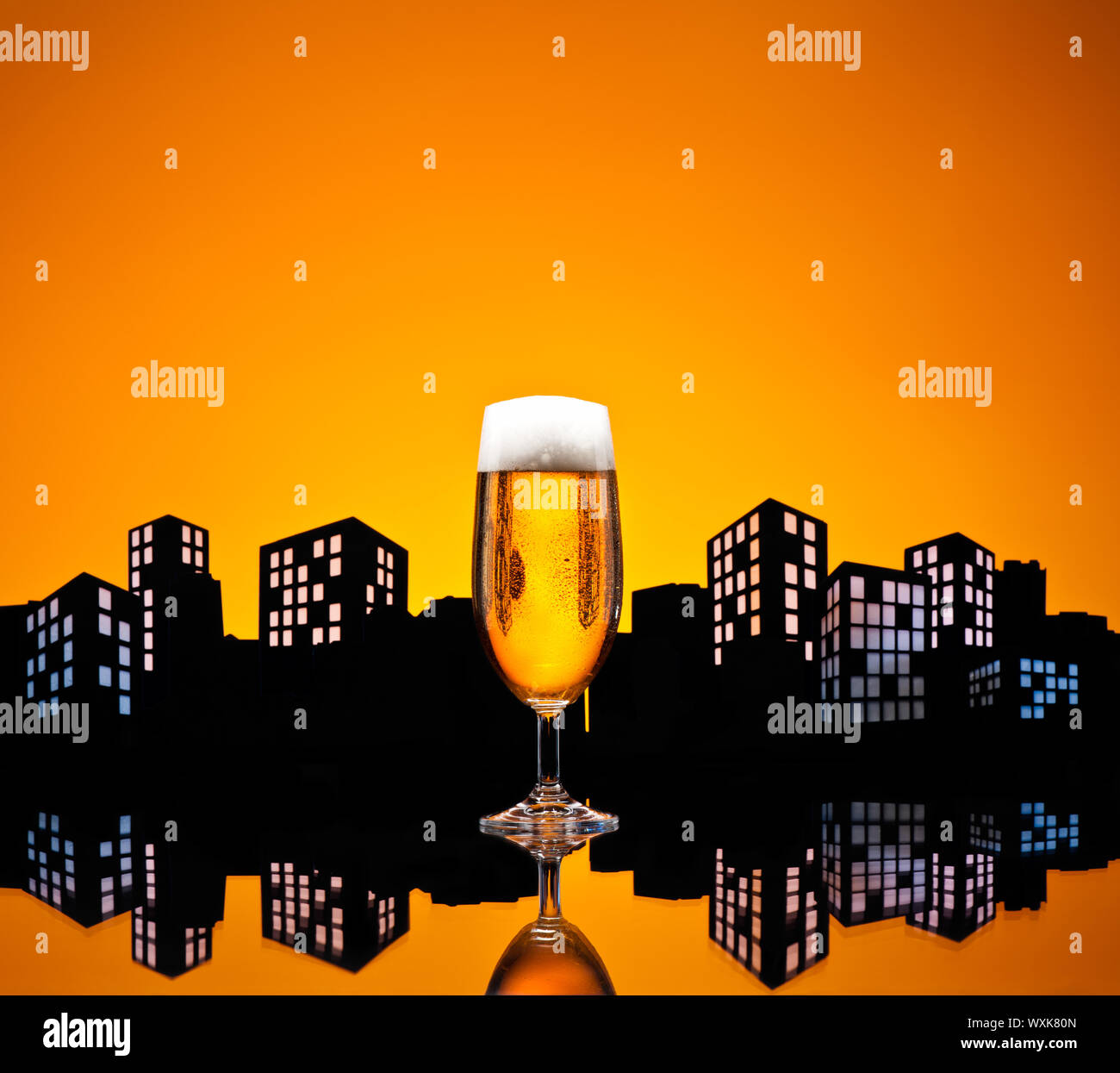 Metropolis lager beer in color skyline setting Stock Photo - Alamy