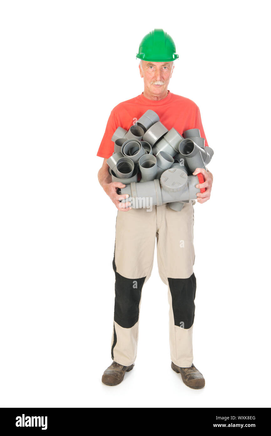 Plumber carrying many pvc pipes Stock Photo - Alamy