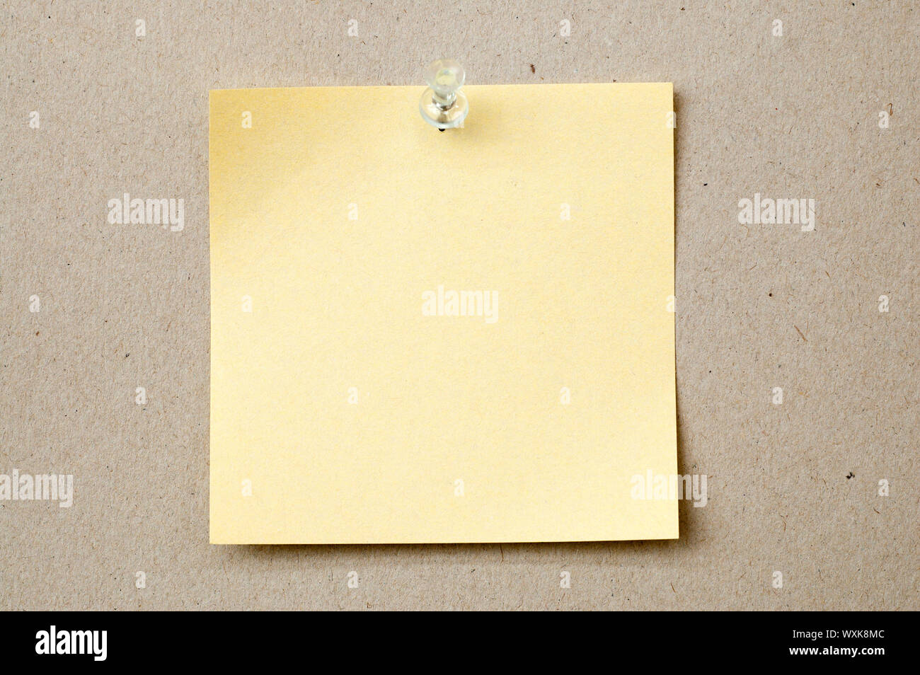 yellow color note paper with pin Stock Photo - Alamy