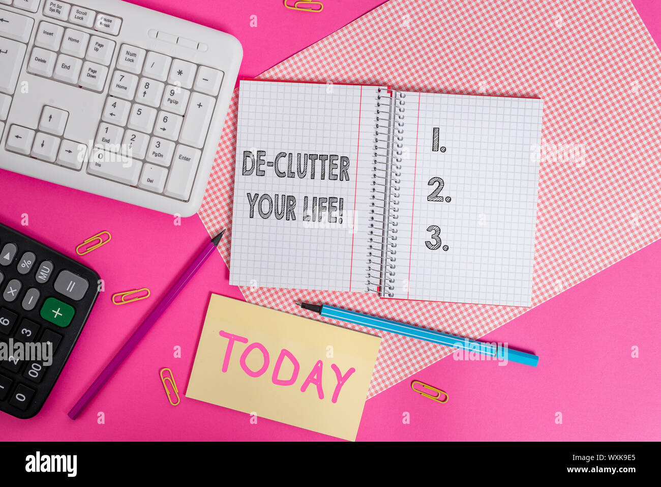 Writing note showing De Clutter Your Life. Business concept for remove unnecessary items from ...