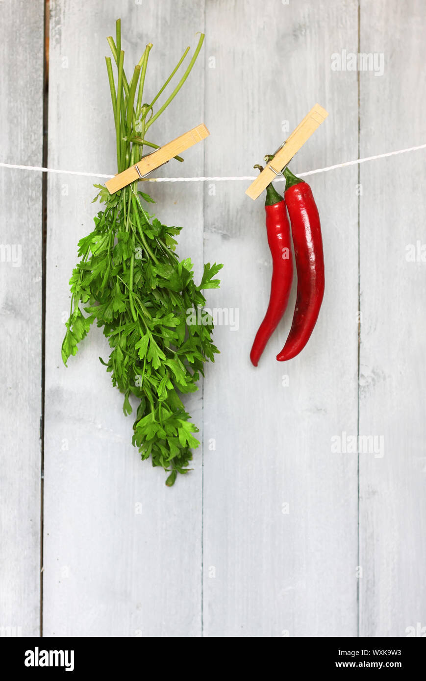 Photo of green parsley and cayenne pepper Stock Photo - Alamy