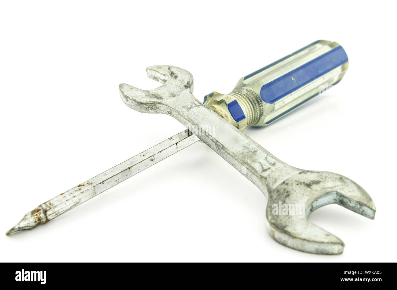 rust Wrench cross Screwdriver isolated on white background Stock Photo ...
