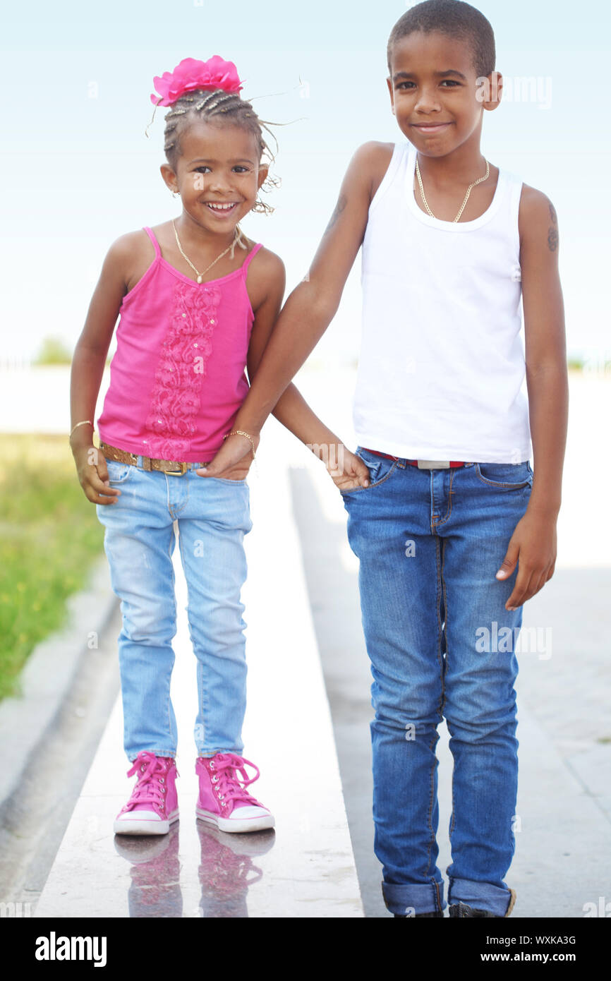Portrait of happy children playing outdoors Stock Photo - Alamy
