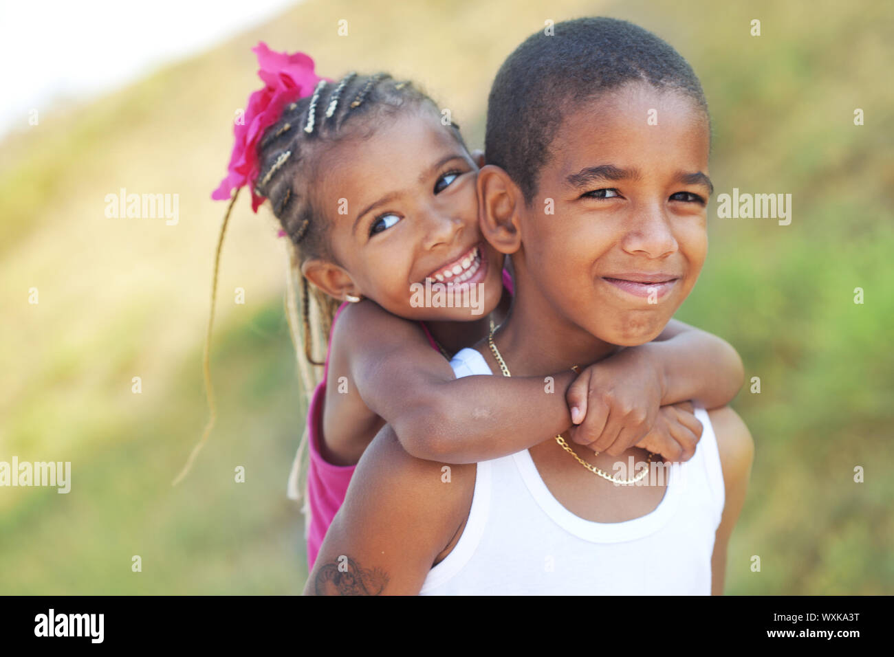 Portrait of happy children playing outdoors Stock Photo - Alamy