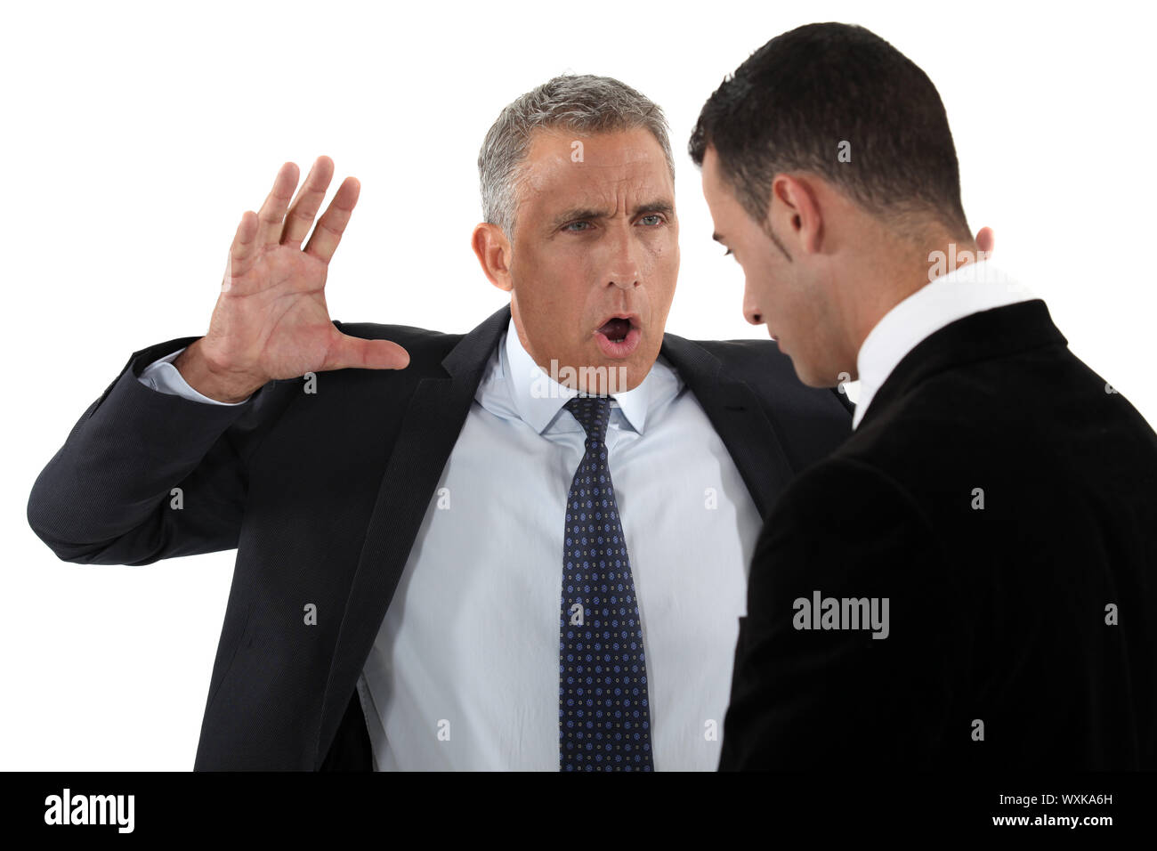 Boss shouting at employee Stock Photo - Alamy