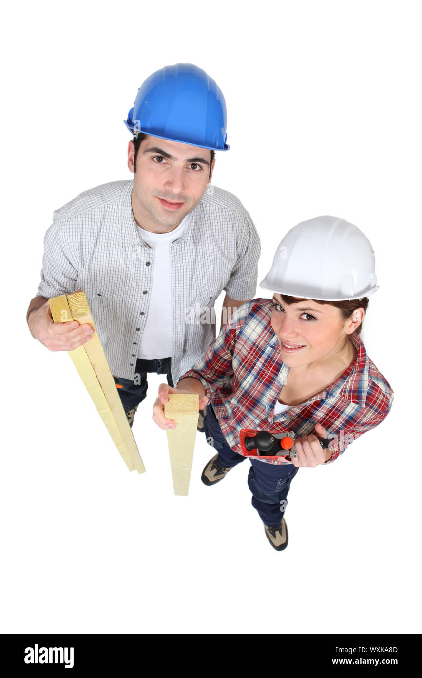 craftsman and craftswoman posing together Stock Photo - Alamy