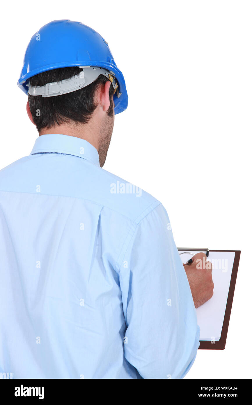 Engineer with a clipboard Stock Photo - Alamy