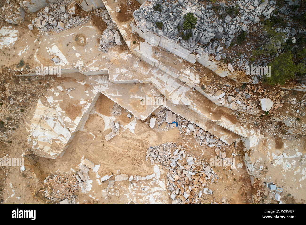 Marble quarry ledges. Terraces of cutted stone material. Aerial view ...