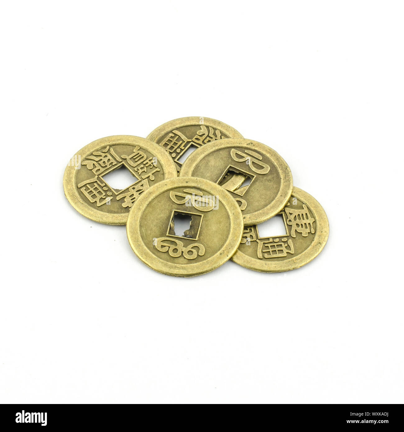 Chinese coins isolated with white background Stock Photo - Alamy