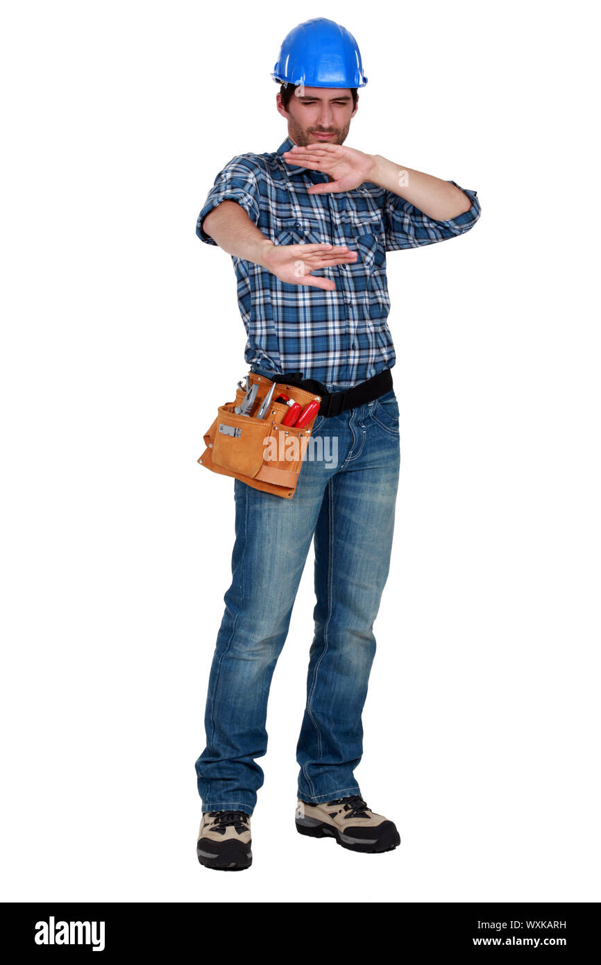 A manual worker protection his eyes Stock Photo - Alamy