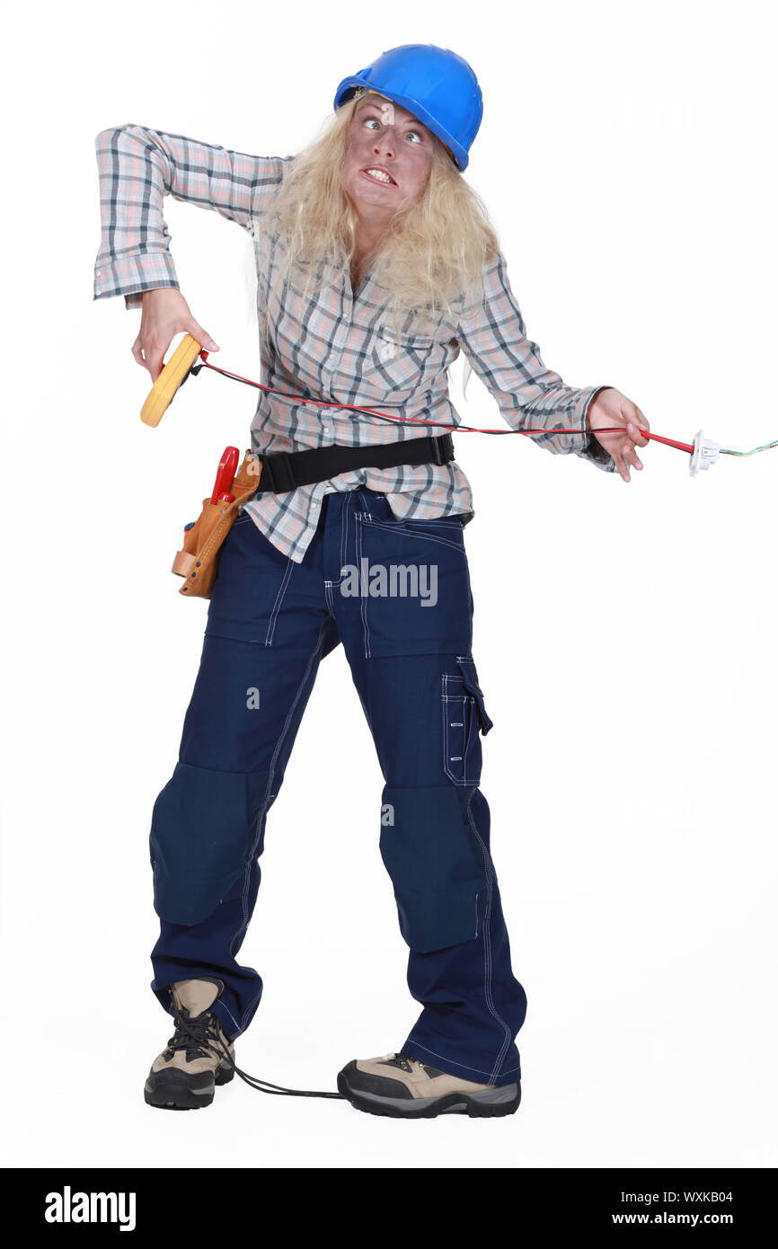 A woman being electrocuted Stock Photo - Alamy