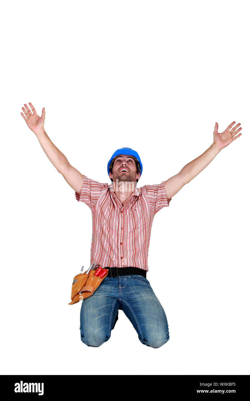 craftsman raising hands Stock Photo - Alamy