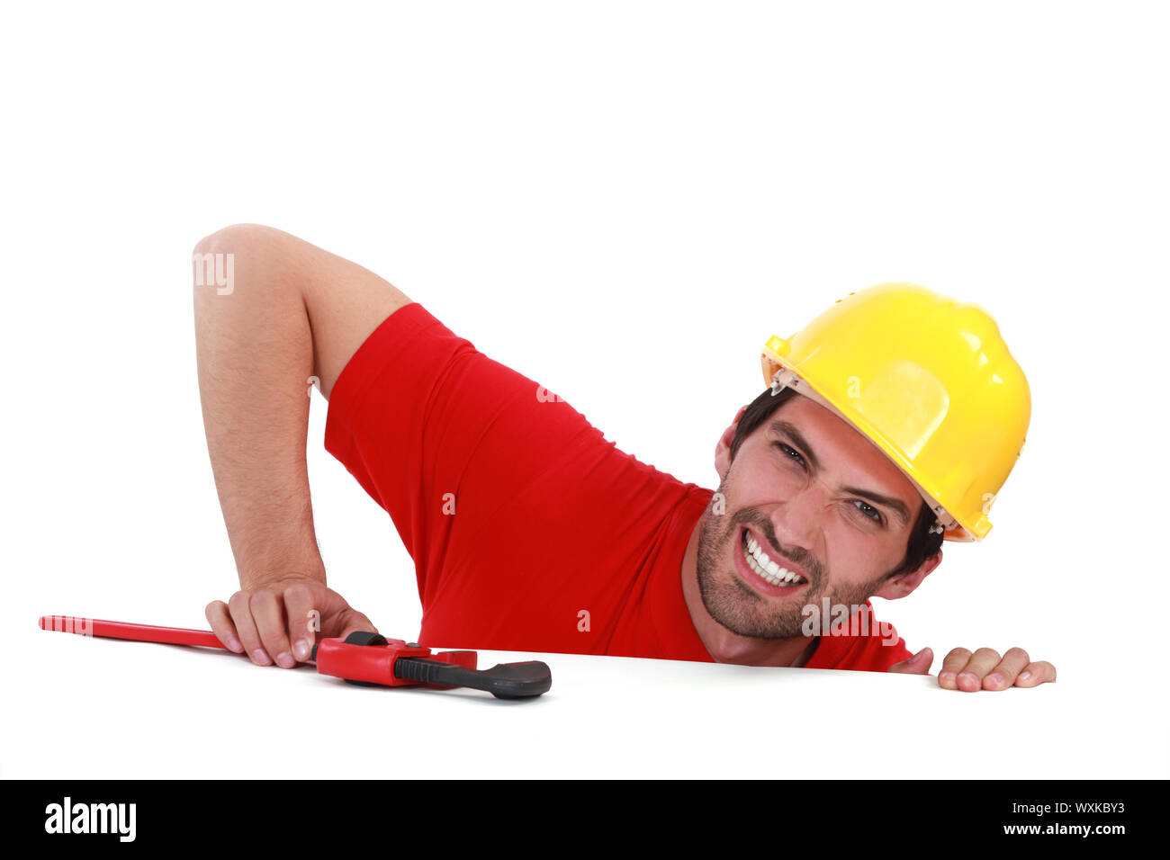 A hurt plumber Stock Photo - Alamy