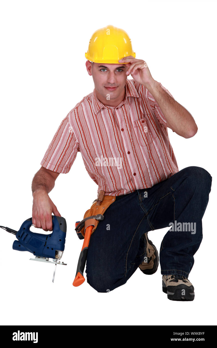 Tradesman giving a salute Stock Photo - Alamy