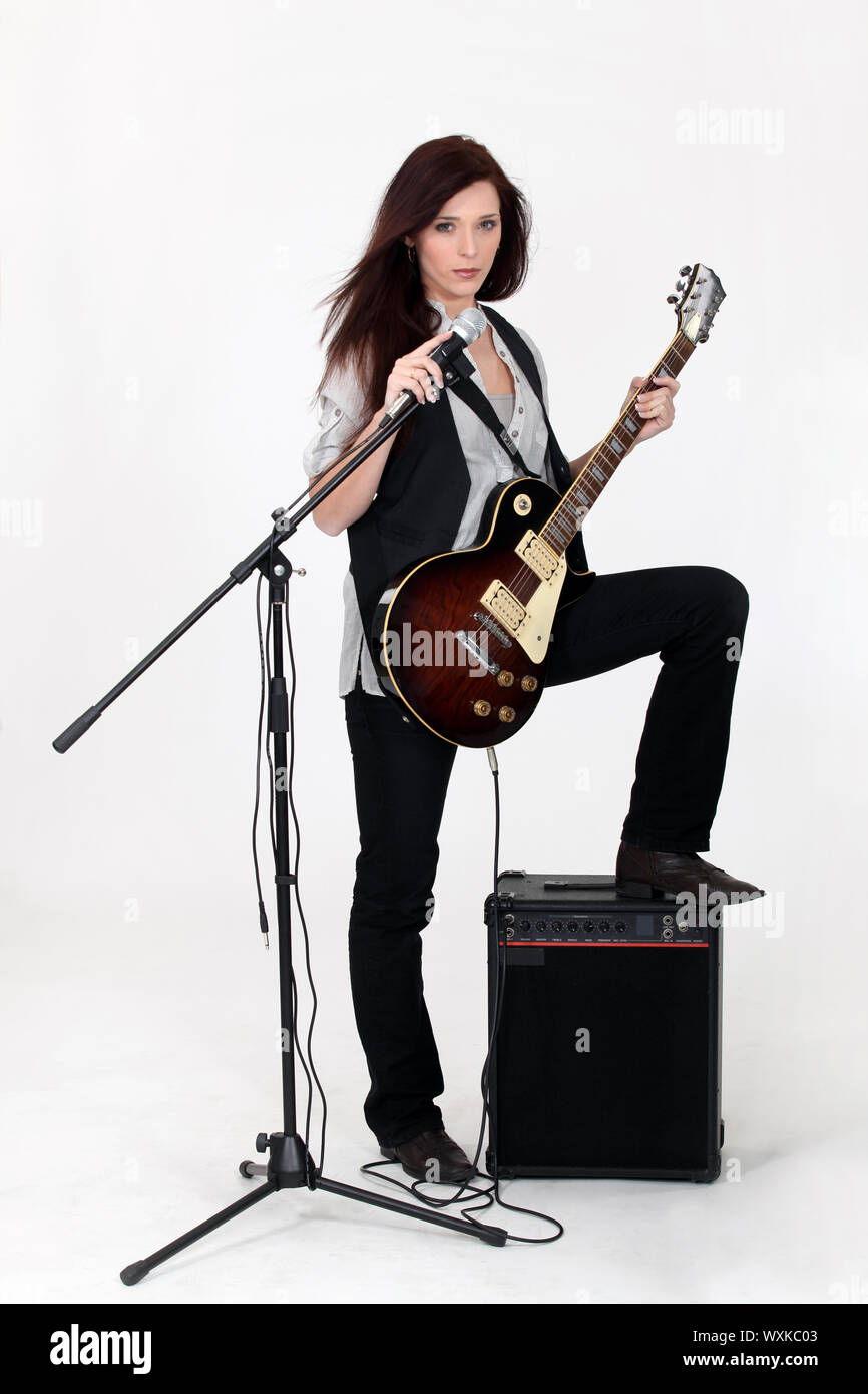 female singer with guitar Stock Photo - Alamy