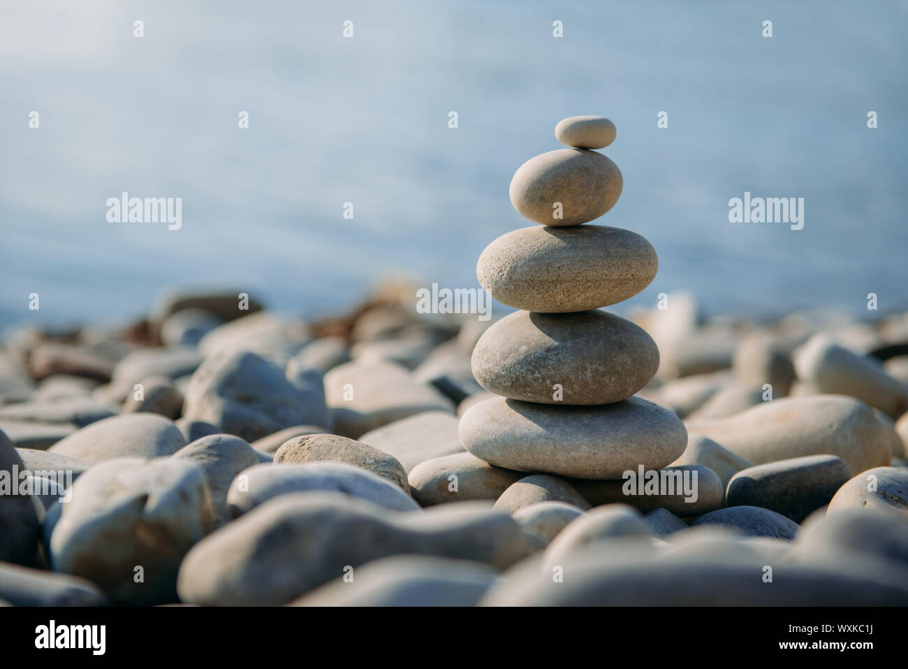 Stack of pebbles on beach Stock Photo - Alamy