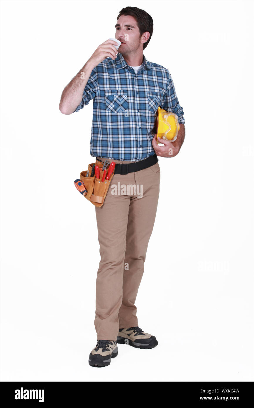 Builder drinking tea Cut Out Stock Images & Pictures - Alamy