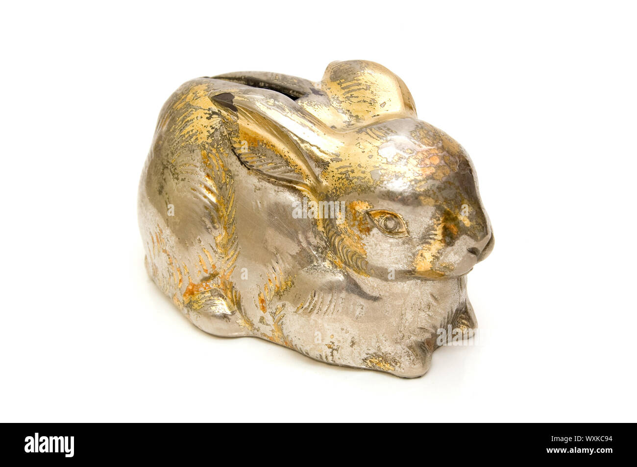 Silver rabbit savings bank on a white background Stock Photo - Alamy