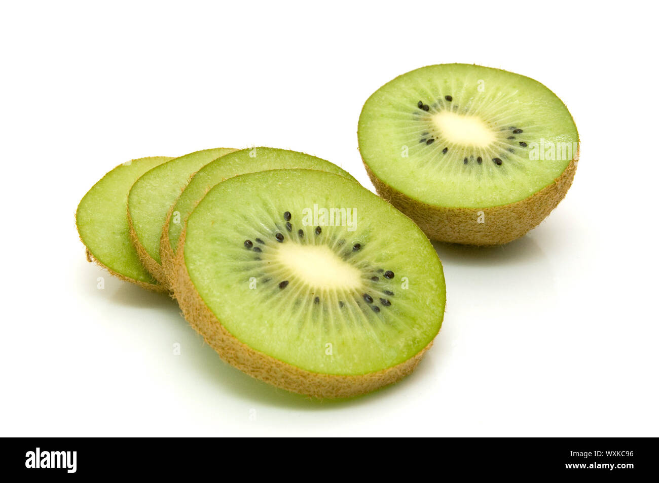Parts of a kiwi on a white background Stock Photo - Alamy