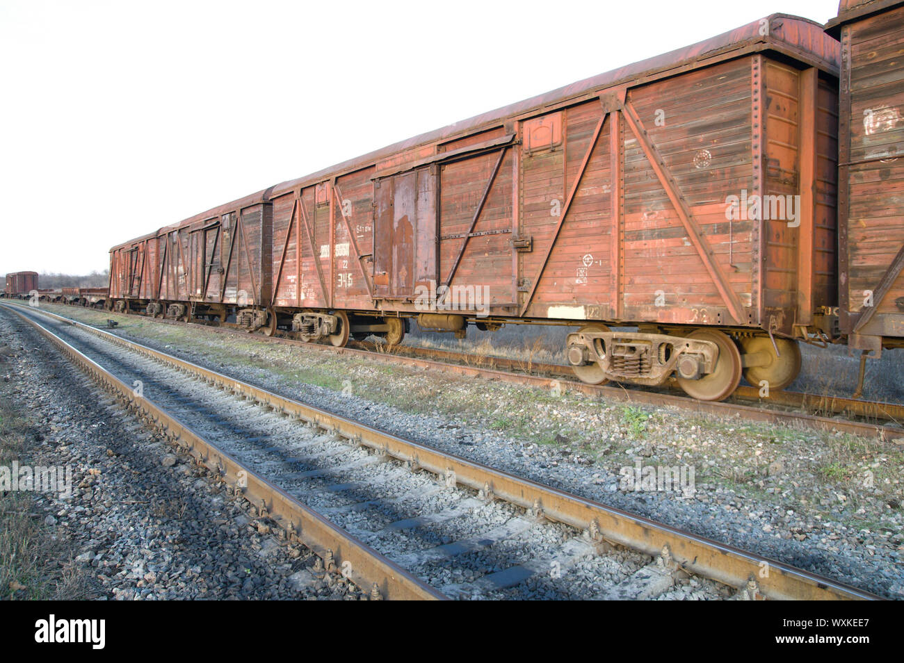 old rusty train wagons on railway Stock Photo - Alamy