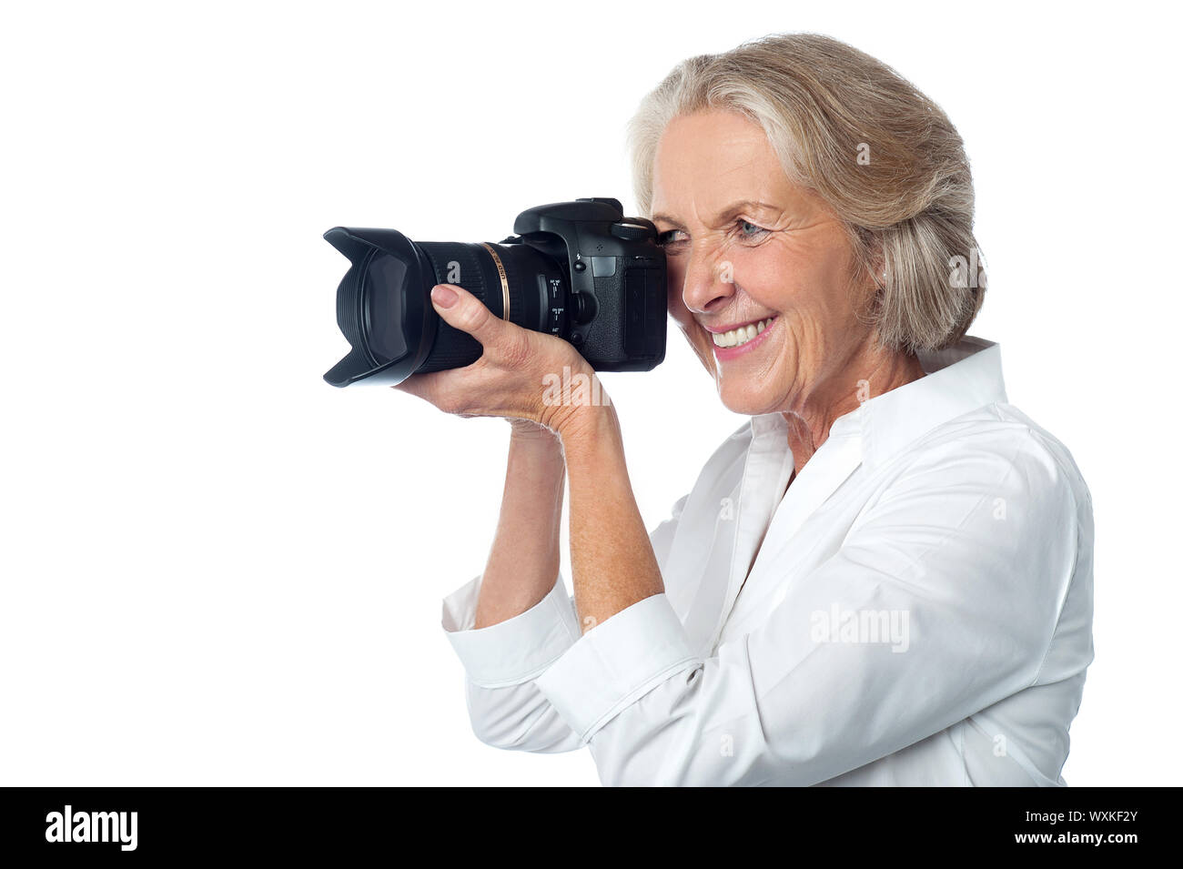 Senior lady taking photos hi-res stock photography and images - Alamy