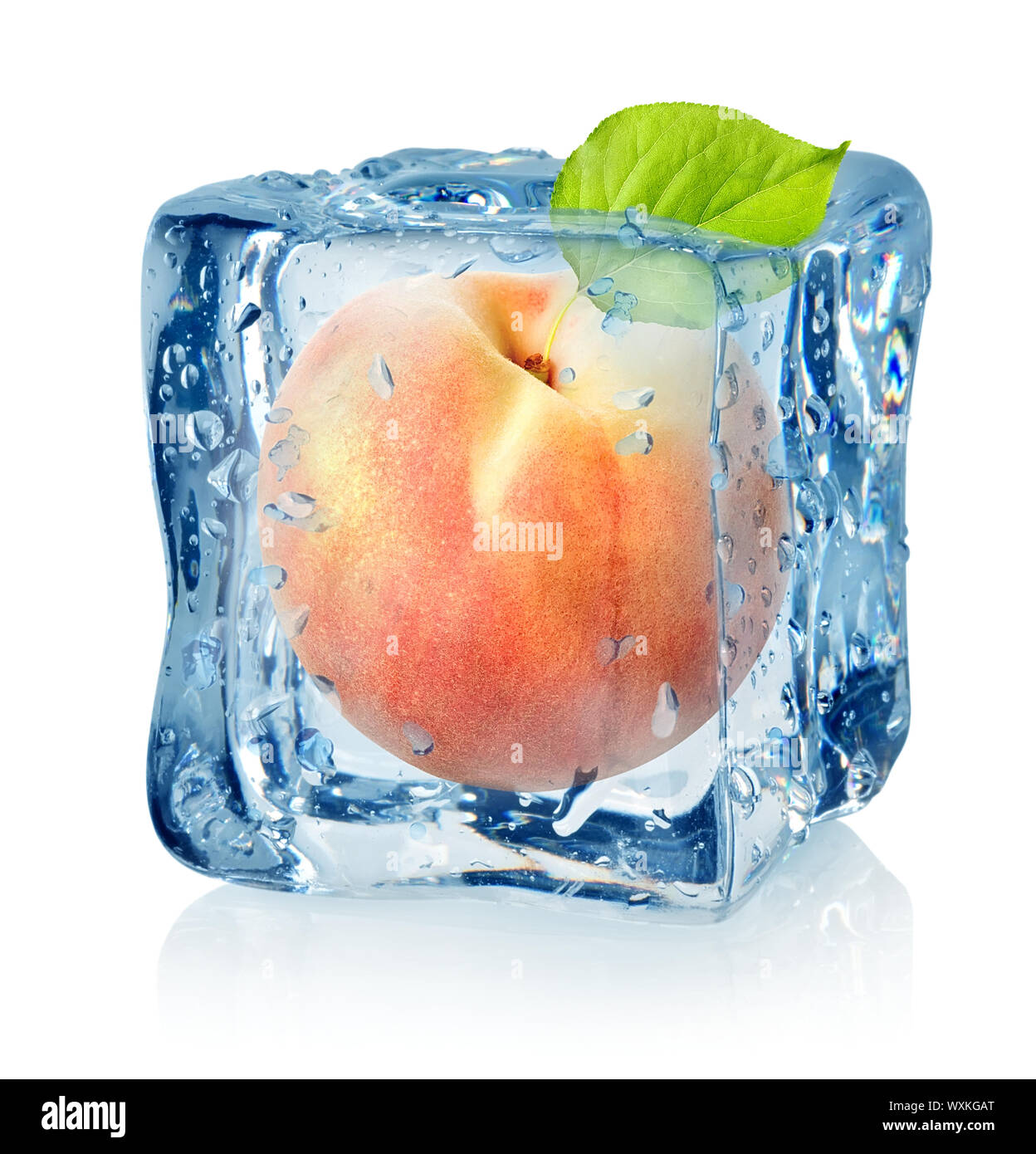 Ice cube and peach isolated on a white background Stock Photo - Alamy