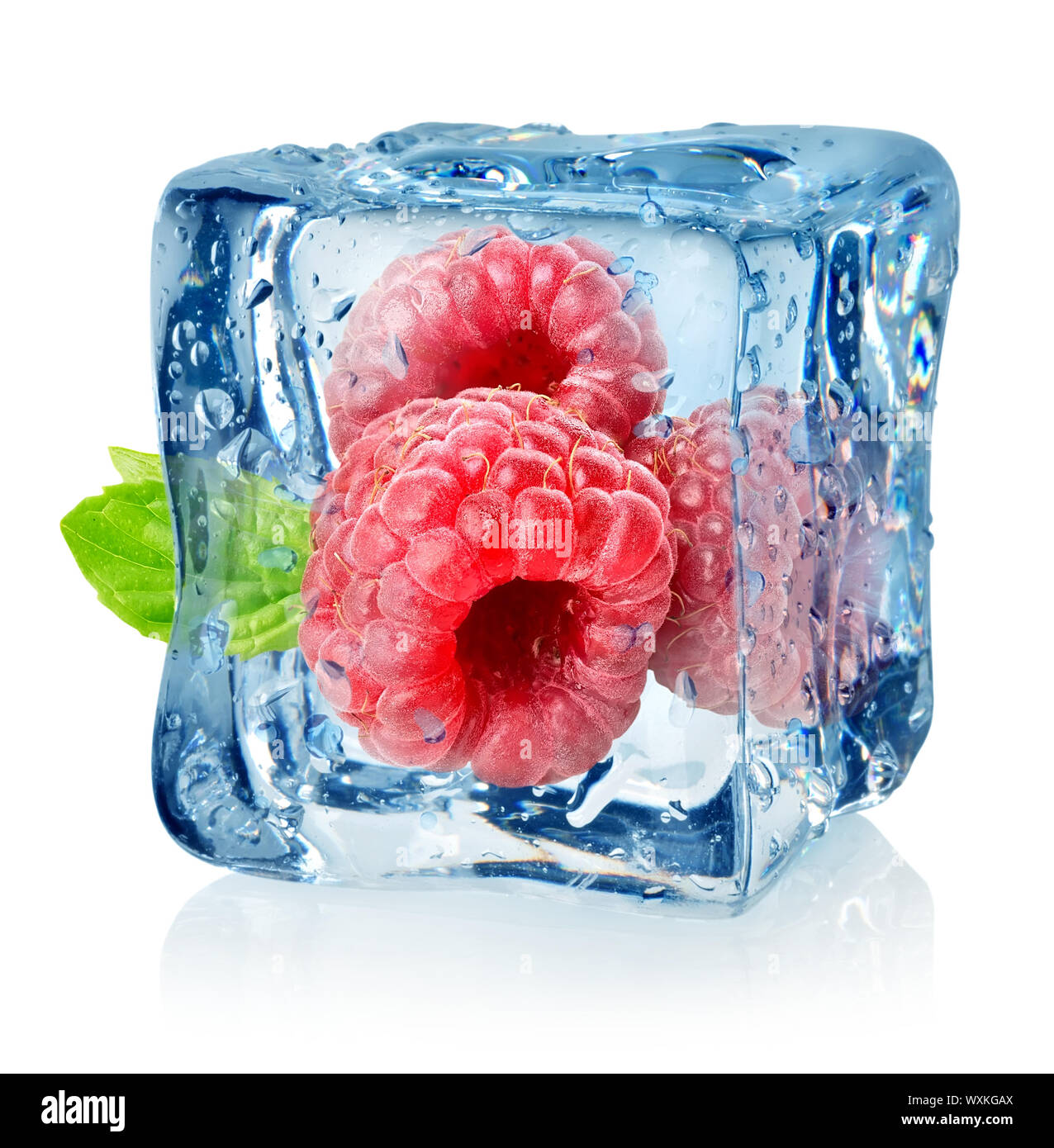 Ice cube and raspberries isolated on a white background Stock Photo - Alamy