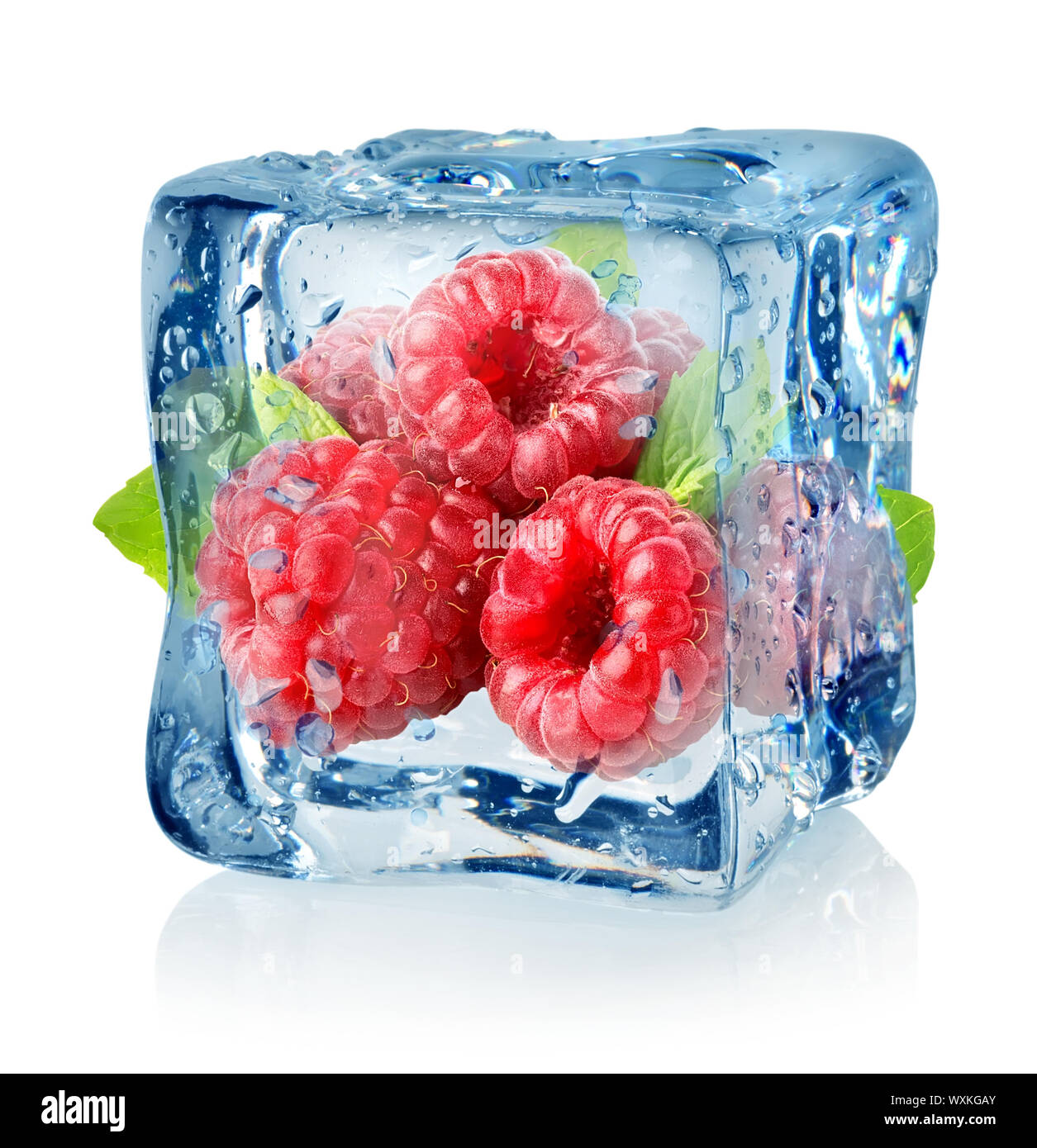 Ice cube and raspberries isolated on a white background Stock Photo - Alamy