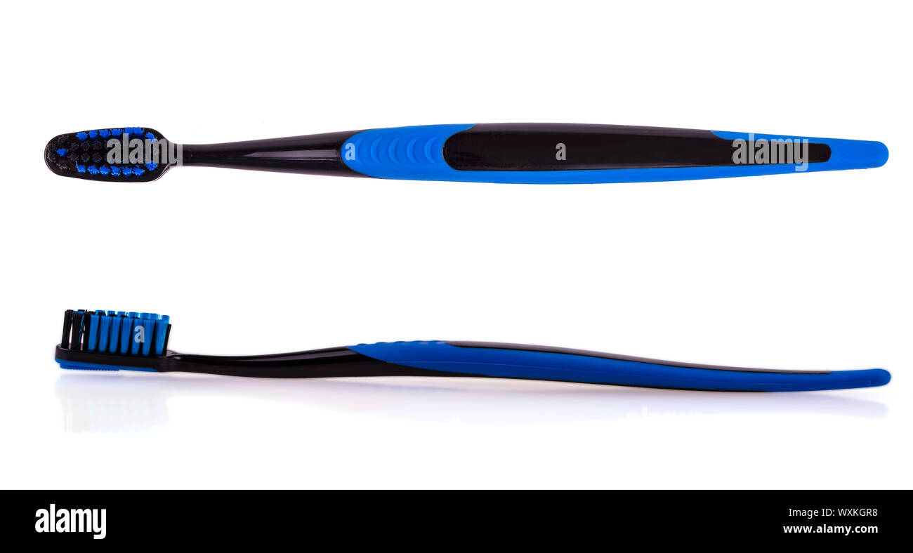 Classic black tooth brush isolated on white background Stock Photo - Alamy