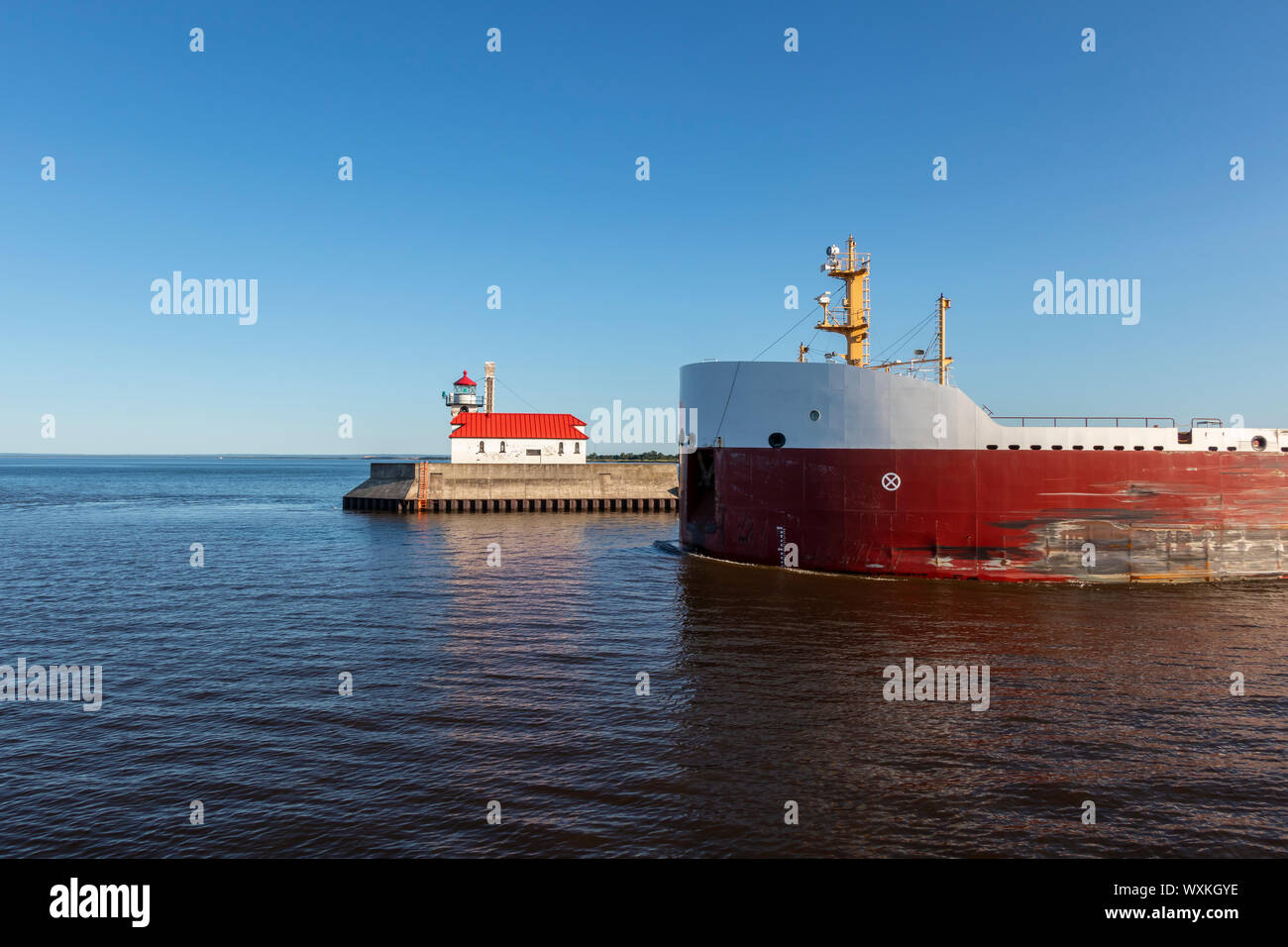 Ship passing breakwater lighthouse hi-res stock photography and images ...