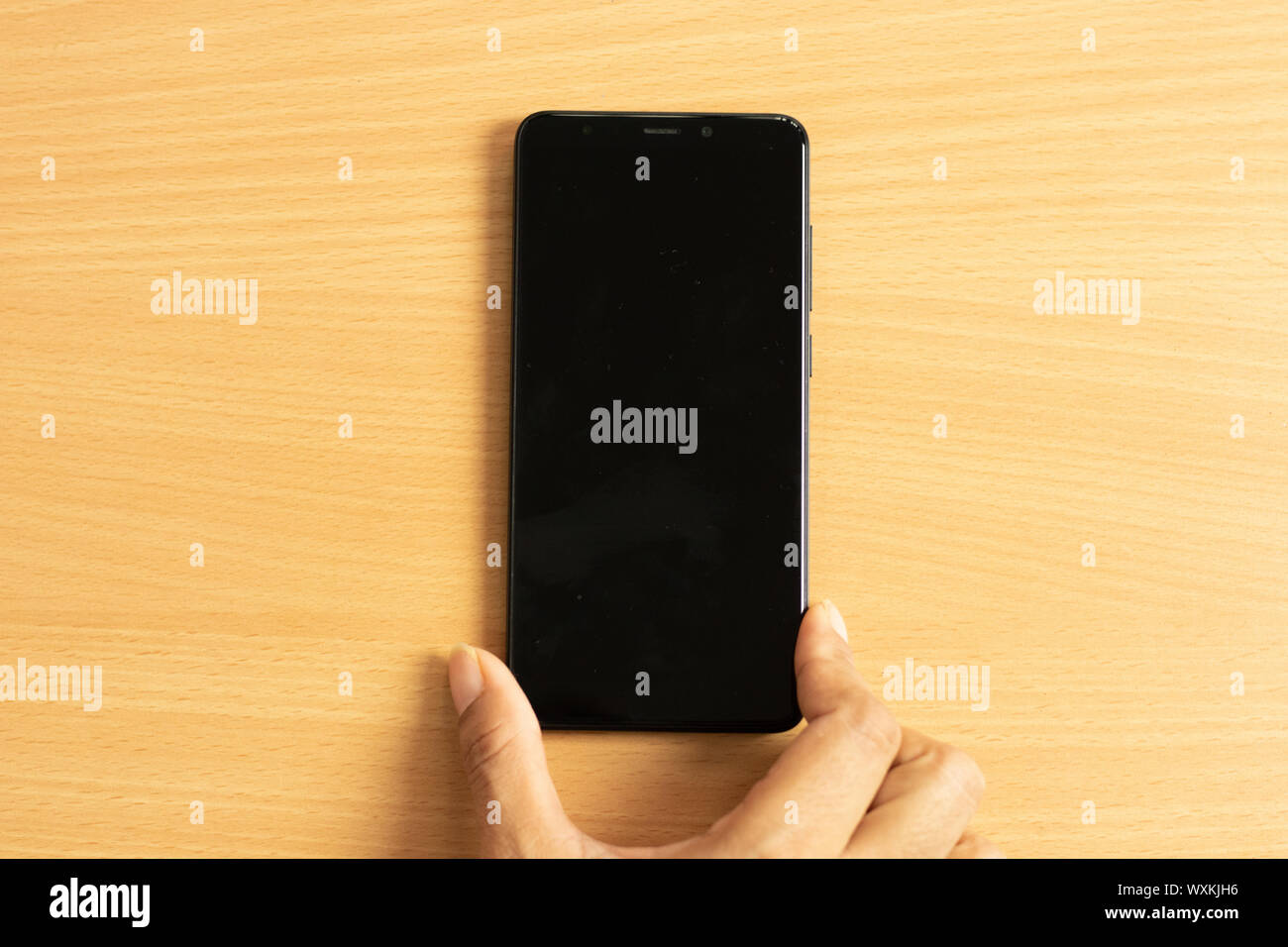 hand using phone white screen on top view Stock Photo - Alamy