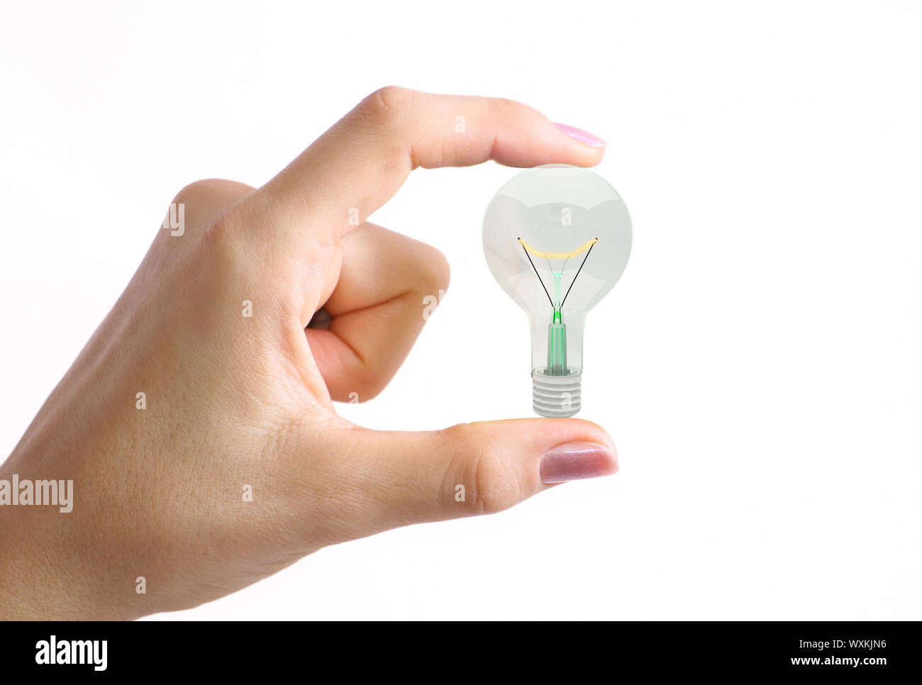 Light bulb in woman hand rapresenting the idea Stock Photo - Alamy