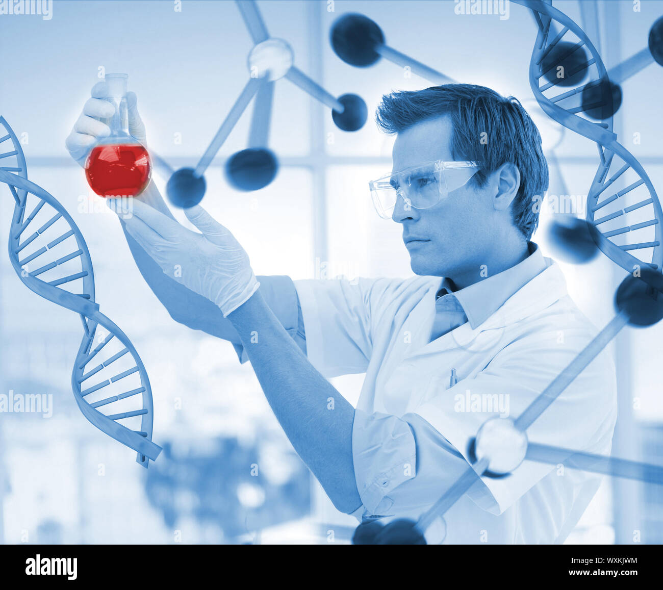 Scientist examining beaker liquid chemical hi-res stock photography and ...