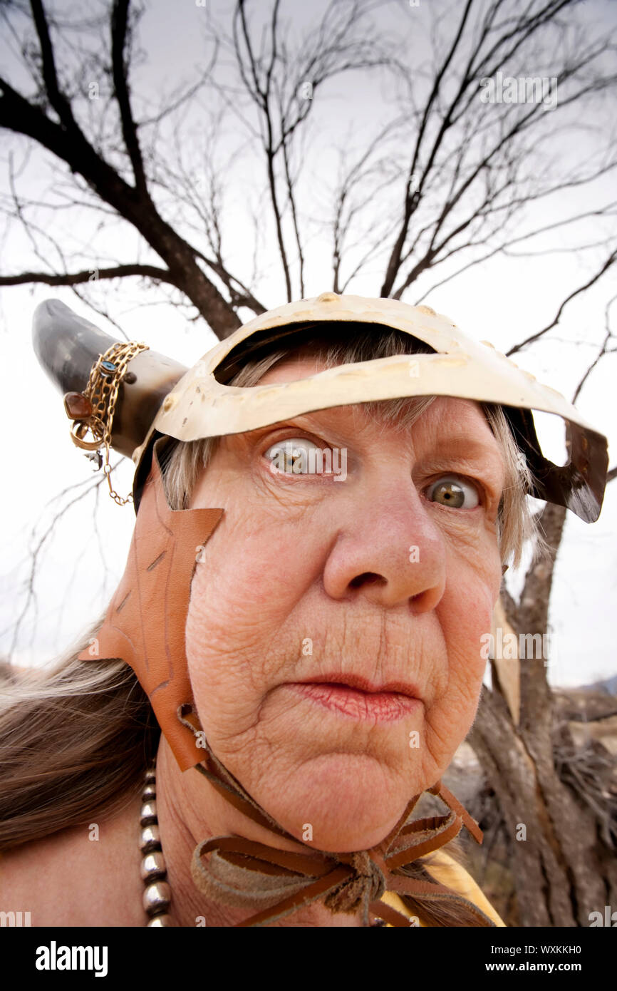 Crazy old woman wearing a Viking helmet Stock Photo - Alamy