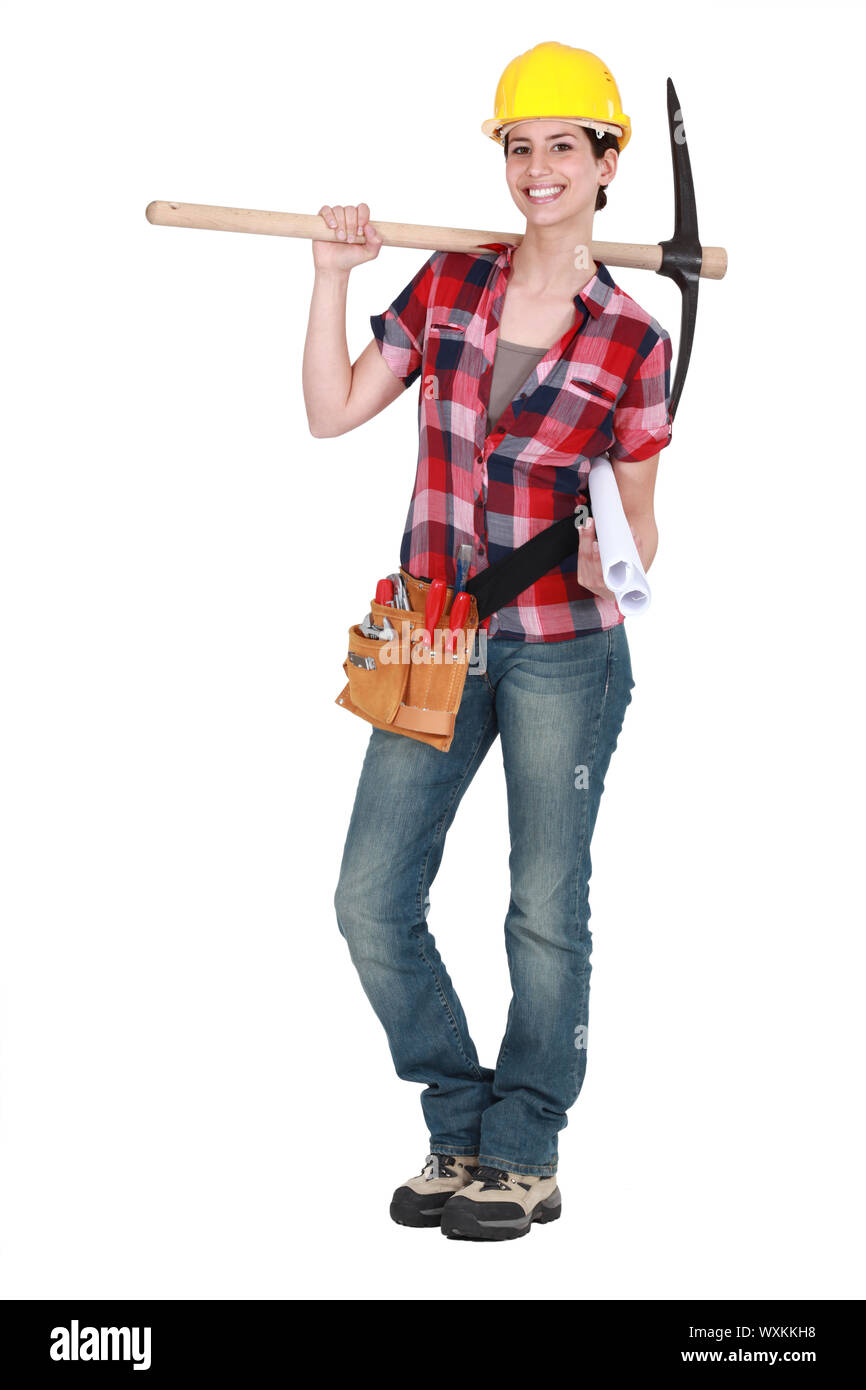 Woman holding pick-axe Stock Photo - Alamy