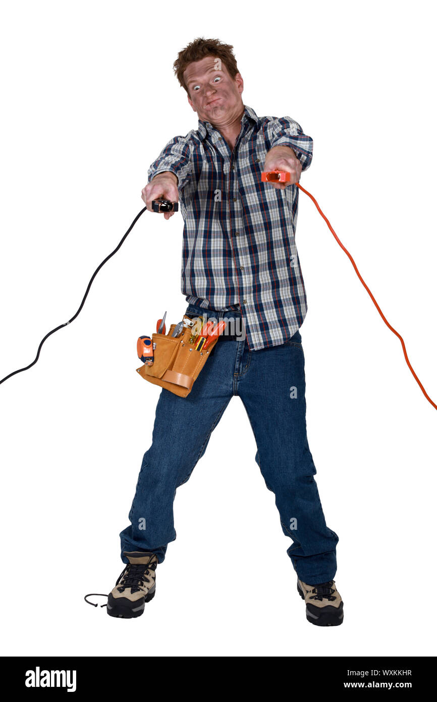 Man holding electrical clamps Stock Photo - Alamy