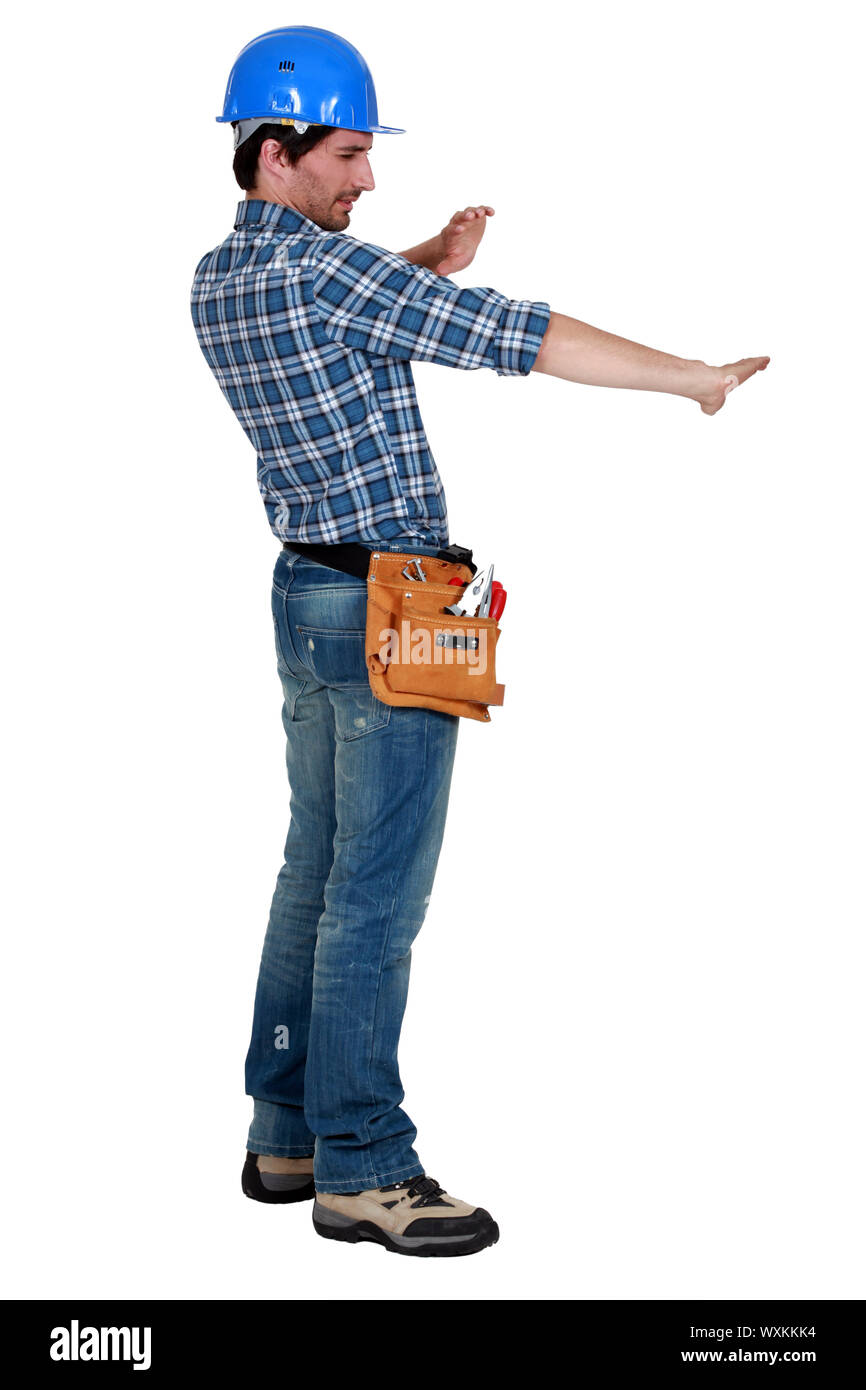 A male construction worker protecting his eyes Stock Photo - Alamy