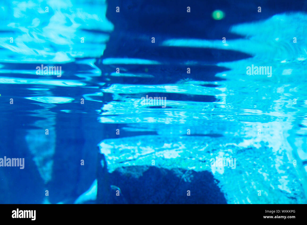Abstract water surface with blue reflection Stock Photo - Alamy