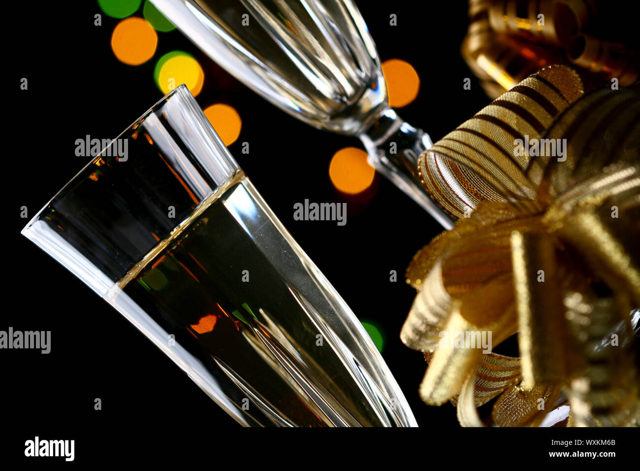 holiday card golden champagne and gift Stock Photo - Alamy
