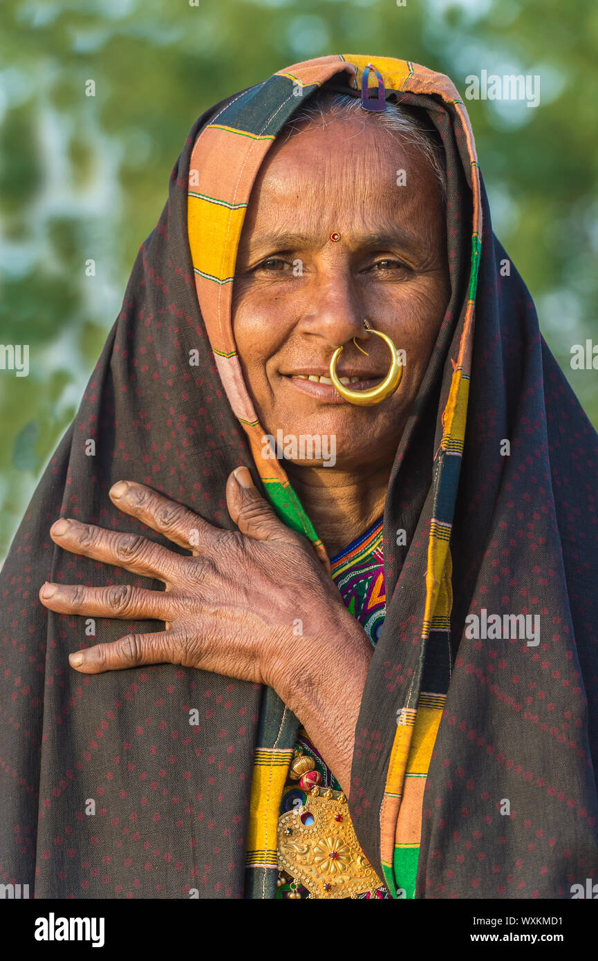 Elderly ahir woman in traditional clothes with a nose ring hi-res stock ...