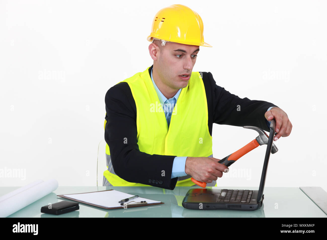 Man smashing computer with hammer hi-res stock photography and images ...