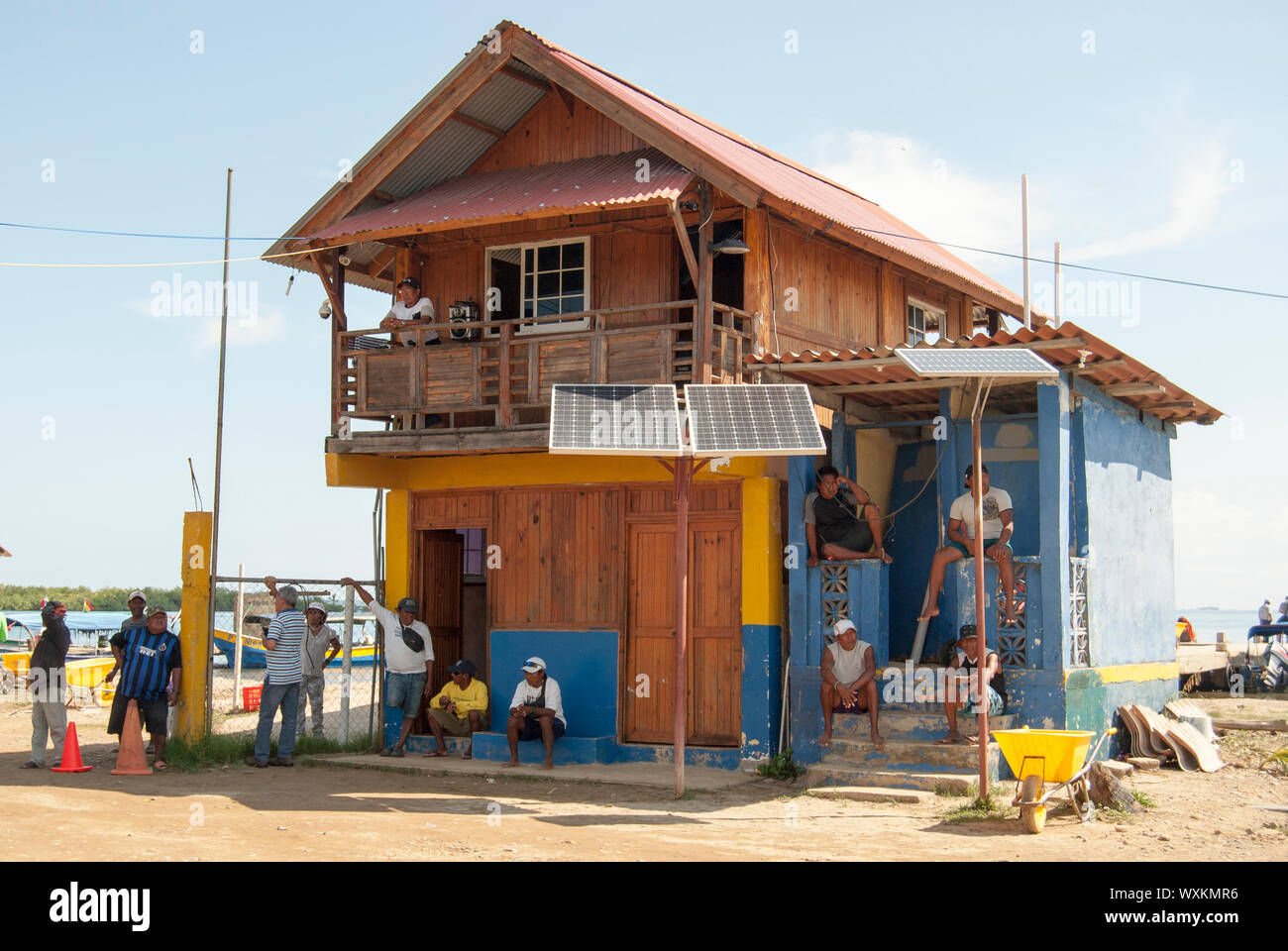 Construction workers, builders, resting at the front of a beautiful ...