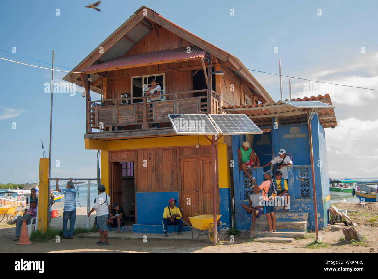 Construction workers, builders, resting at the front of a beautiful ...