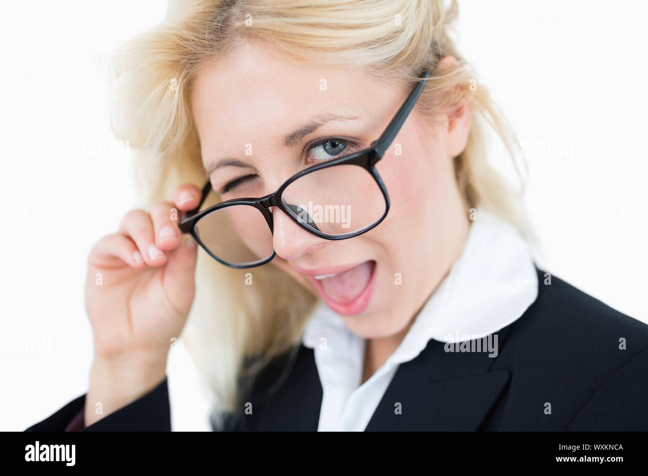 Closeup portrait of beautiful business woman winking over white ...