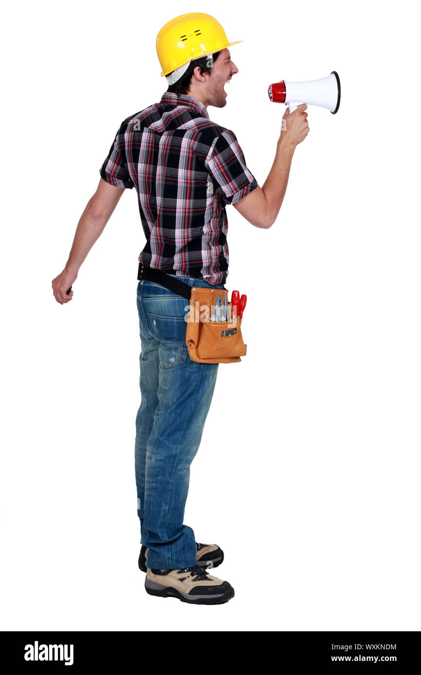 Foreman screaming in a bullhorn Stock Photo - Alamy