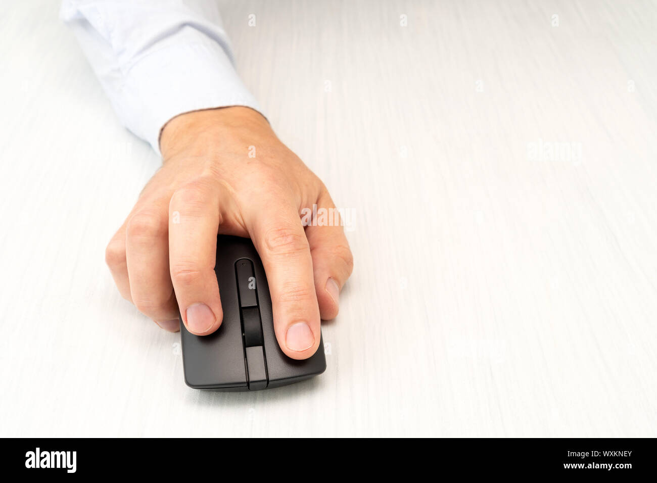 Businessman using computer. Picture of man hand with wireless computer ...